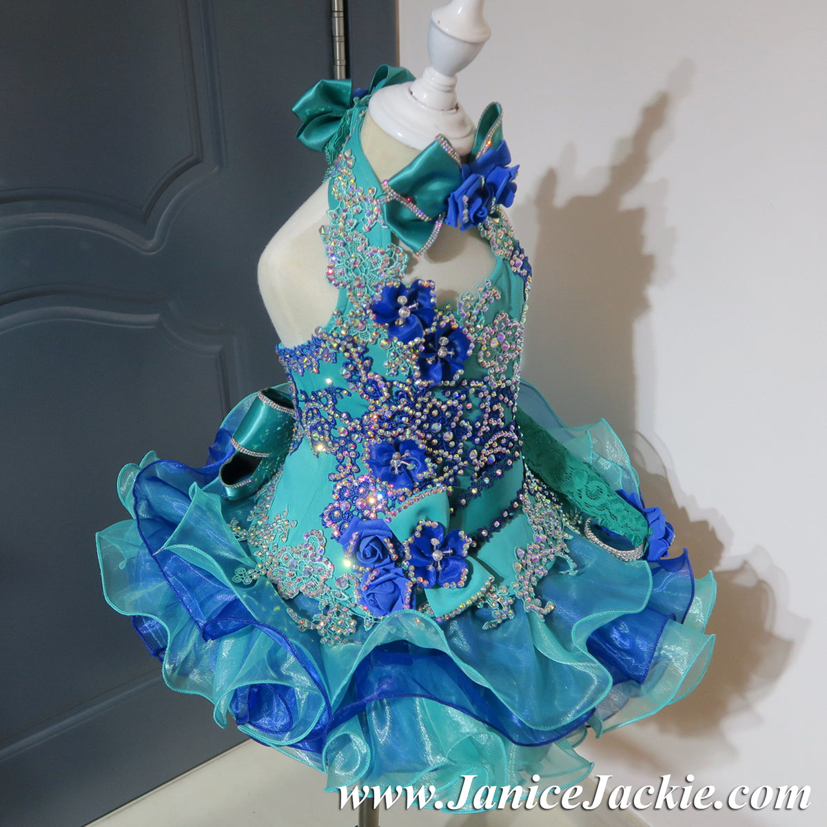 (#1063) Halter flared mega glitz national pageant dress. (green + blue ...